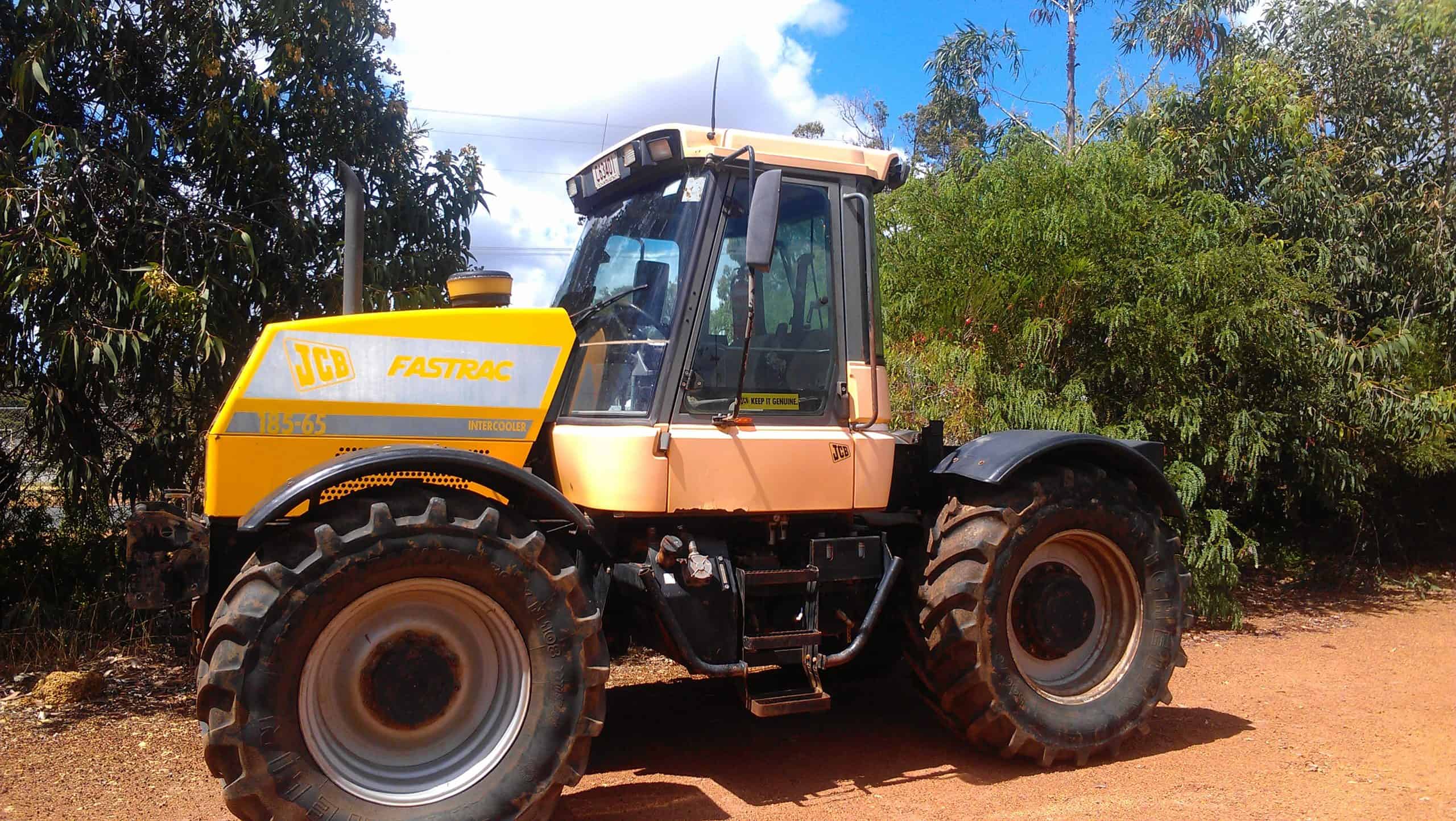 TRACTORS AND WATER CART - The Auctioneering Co